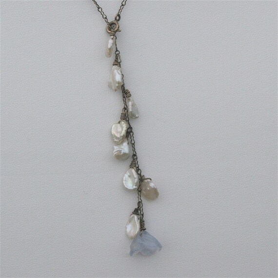 antique silver with white keshi pearls and calsidney flower