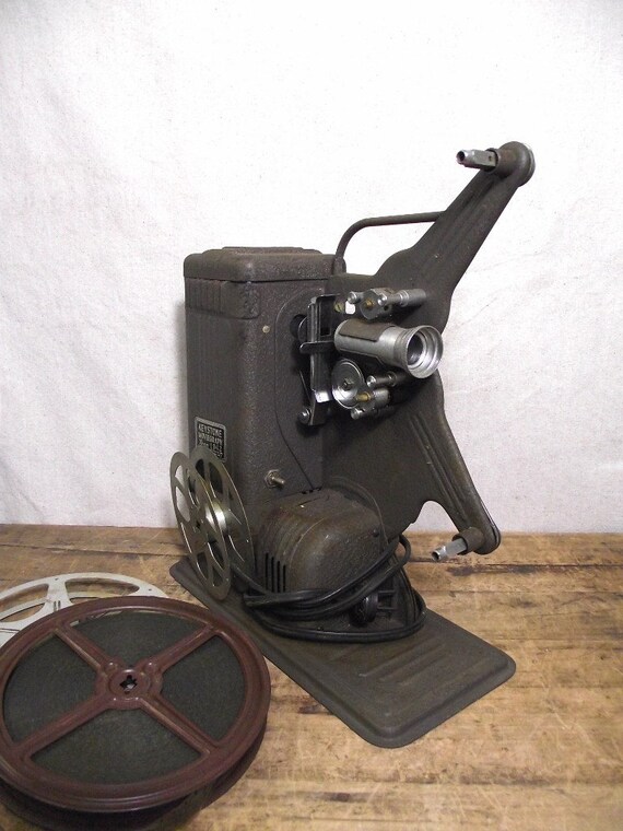 Reduced Vintage Keystone Moviegraph Projector with reels 16mm