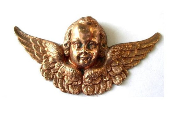 Vintage angel head with wings metal stamping made of copper