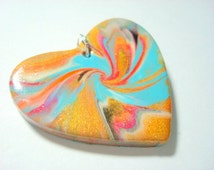 Popular items for clay heart pendant on Etsy
