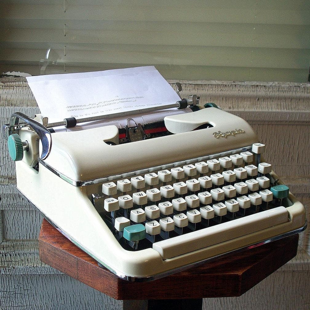 Vintage Olympia Manual Typewriter with Case by lisabretrostyle2