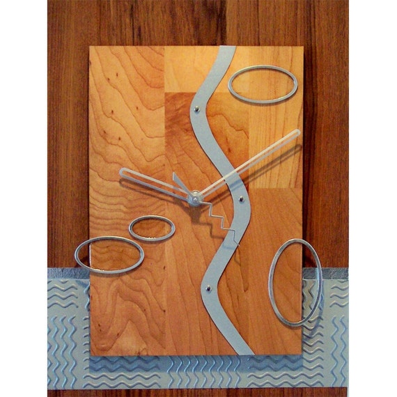 Items similar to Modern Silver Swirl Clock with Aluminum Ovals makes a ...