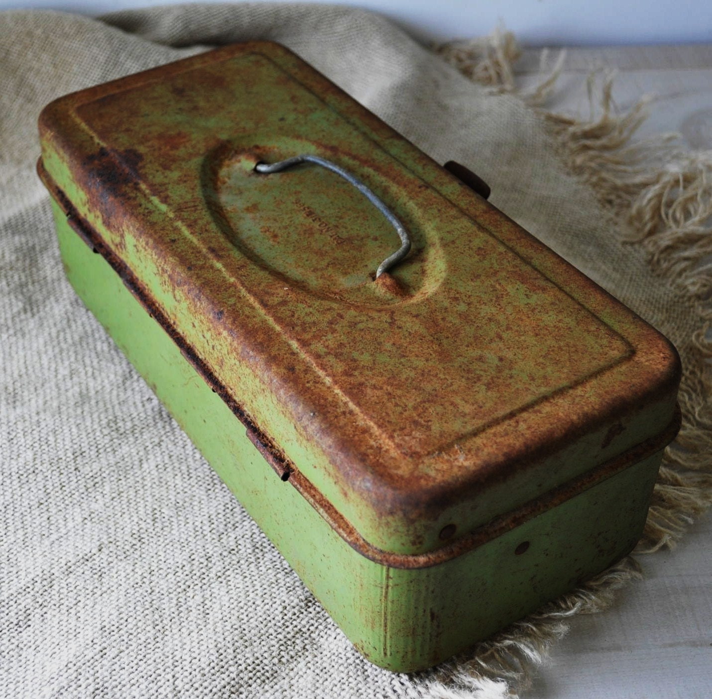 vintage green rustic metal fishing tackle boxcamping