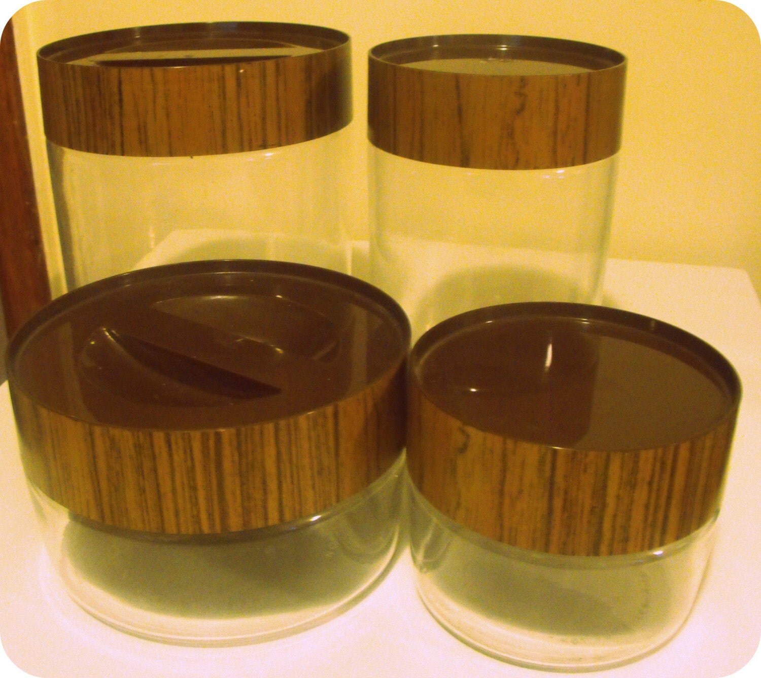 Four Vintage Pyrex Glass Canisters