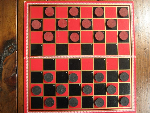 Checkers game pieces vintage wooden