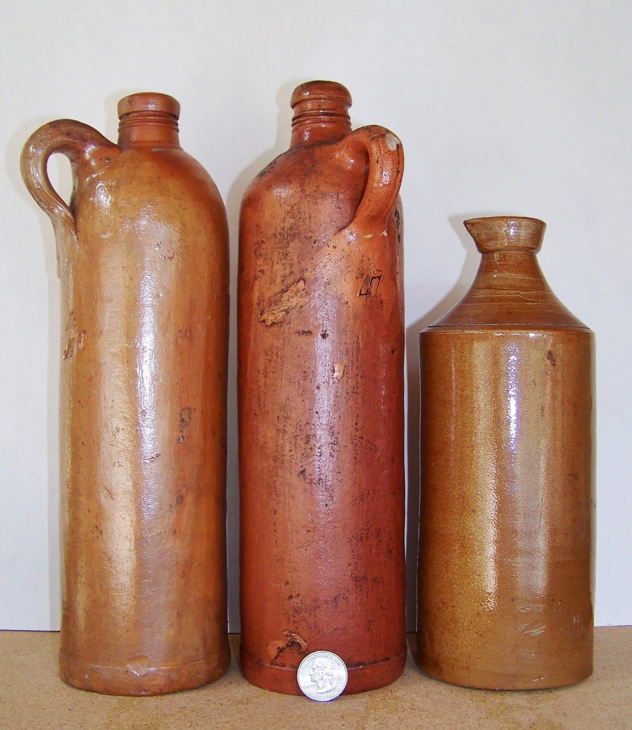 Three Antique Clay Bottles