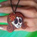 Day of the Dead female calaca with rose necklace
