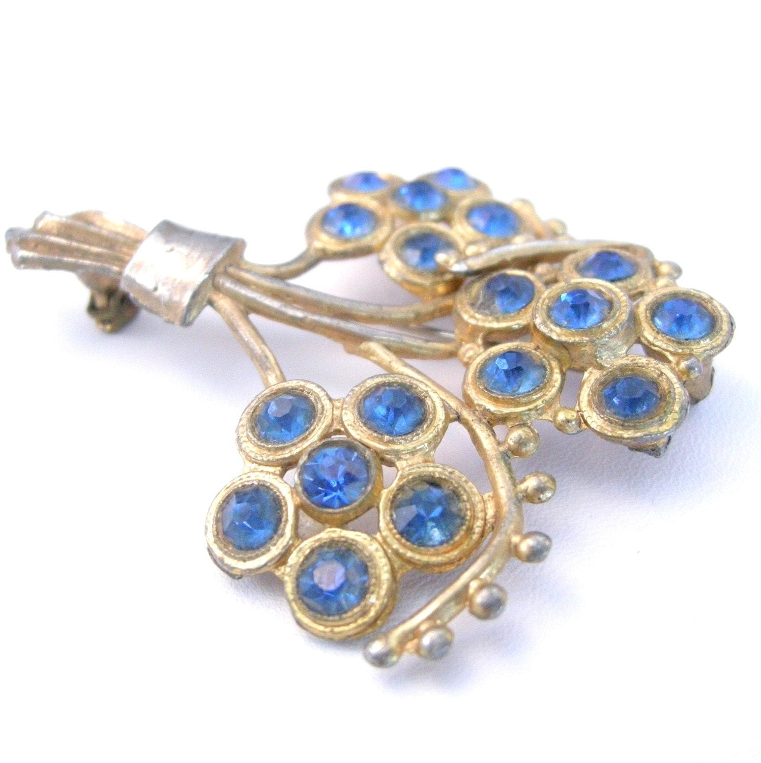 Vintage gold pot metal bouquet brooch with blue rhinestones, unsigned ...