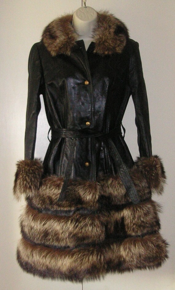 HIGHLANDER black leather coat with fur trim around sleeves and
