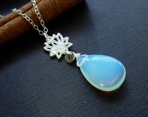 Unique blue lotus necklace related items | Etsy