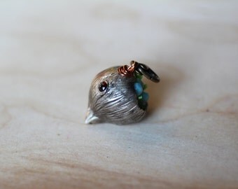 Items similar to Silver bird head and wing lariat on Etsy