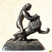 Samson the hero and the lion a bronze sculpture