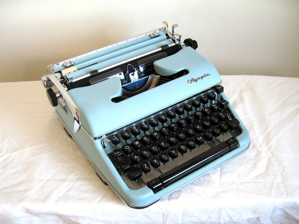 Vintage Blue Olympia SM-4 Typewriter Cursive by TypewriterLoft