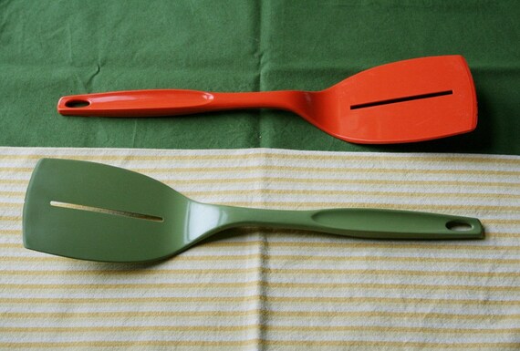 Two Foley spatulas in super retro colors reserved for Trisha