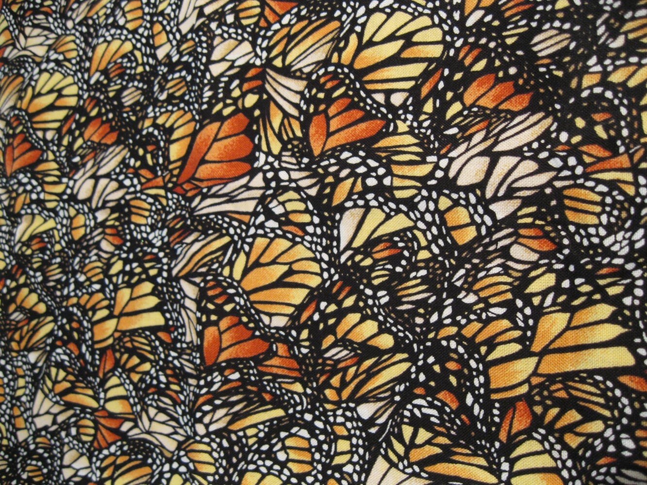 fabric monarch butterfly print wings oarnge and black
