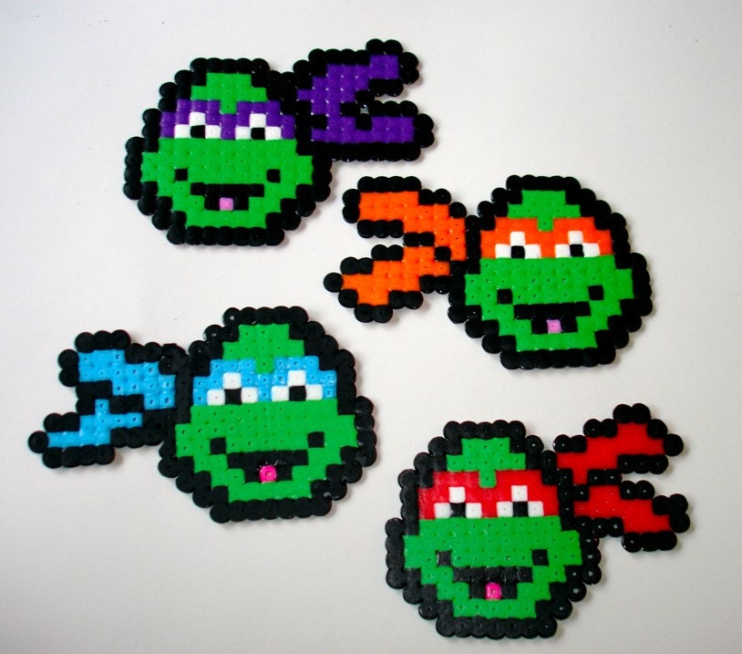 Teenage Mutant Ninja Turtle magnets. Set of four. TNMT
