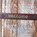 Carved Walnut Celtic Welcome Sign
