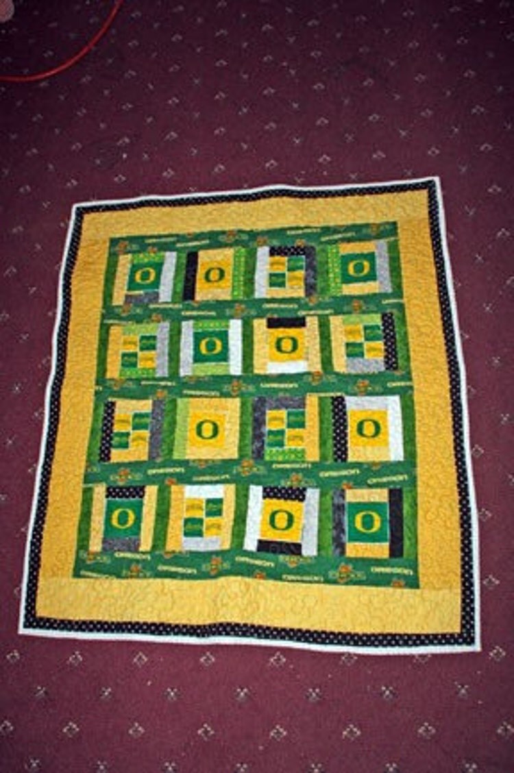 University of Oregon Ducks Baby Quilt by MamaJeansKindThreads