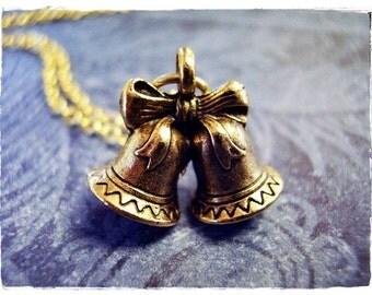 Popular items for bell necklace on Etsy