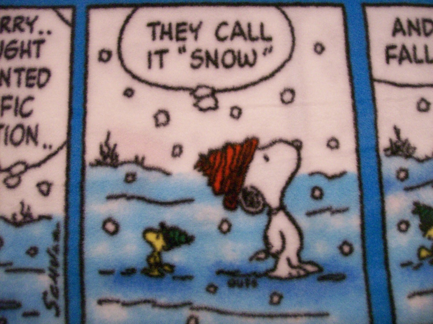 An Adorable Peanuts Snoopy Let it Snow Comics Fleece Fabric