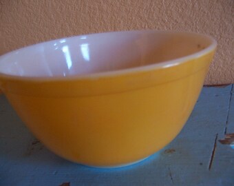 charming orange pyrex bowl
