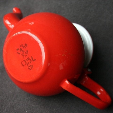 The cute little red teapot