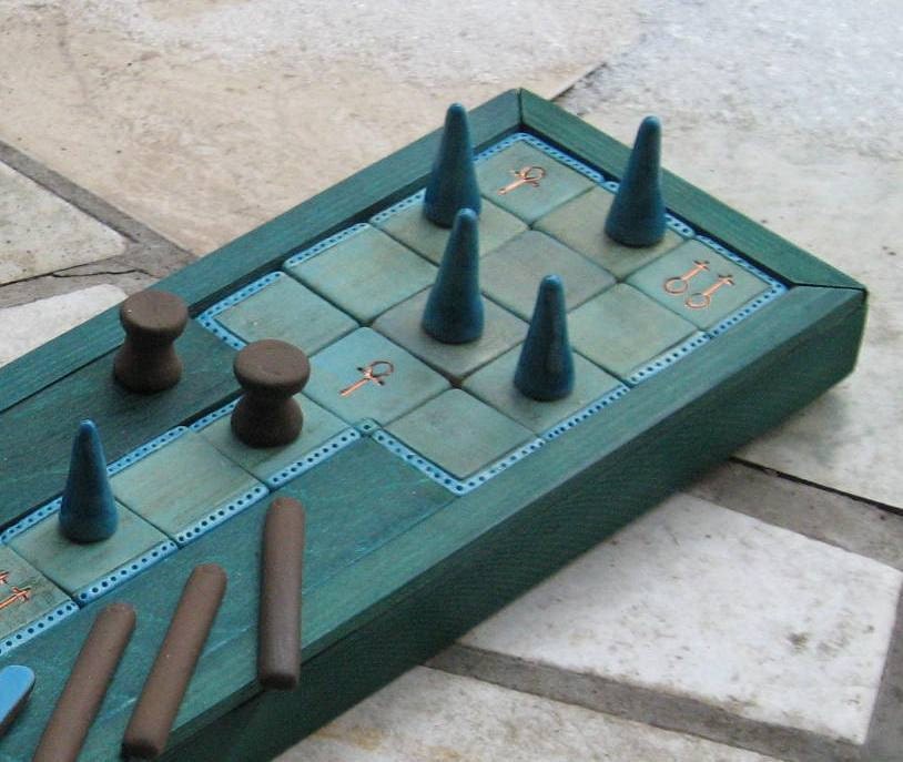 Ancient Egyptian Aseb game board or Twenty squares game with