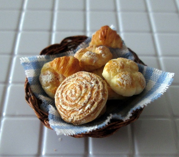 Assorted bread in a basket by Asakomini on Etsy