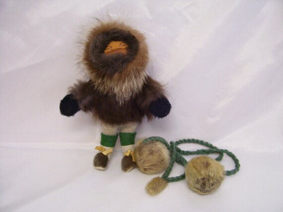 Vintage Eskimo Inuit doll with Eskimo yo-yo toy