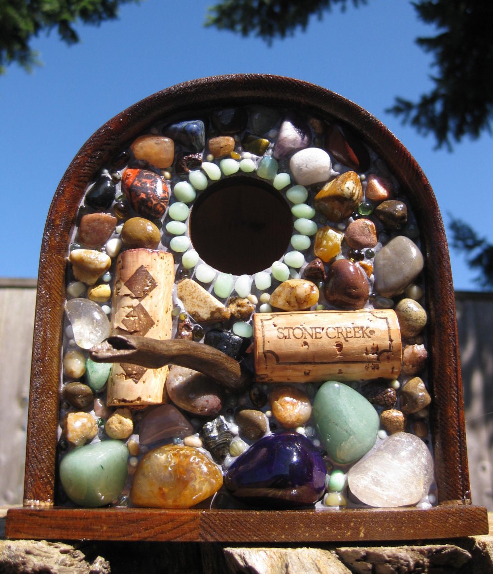 Stone Birdhouse ready to hang on a fence or tree