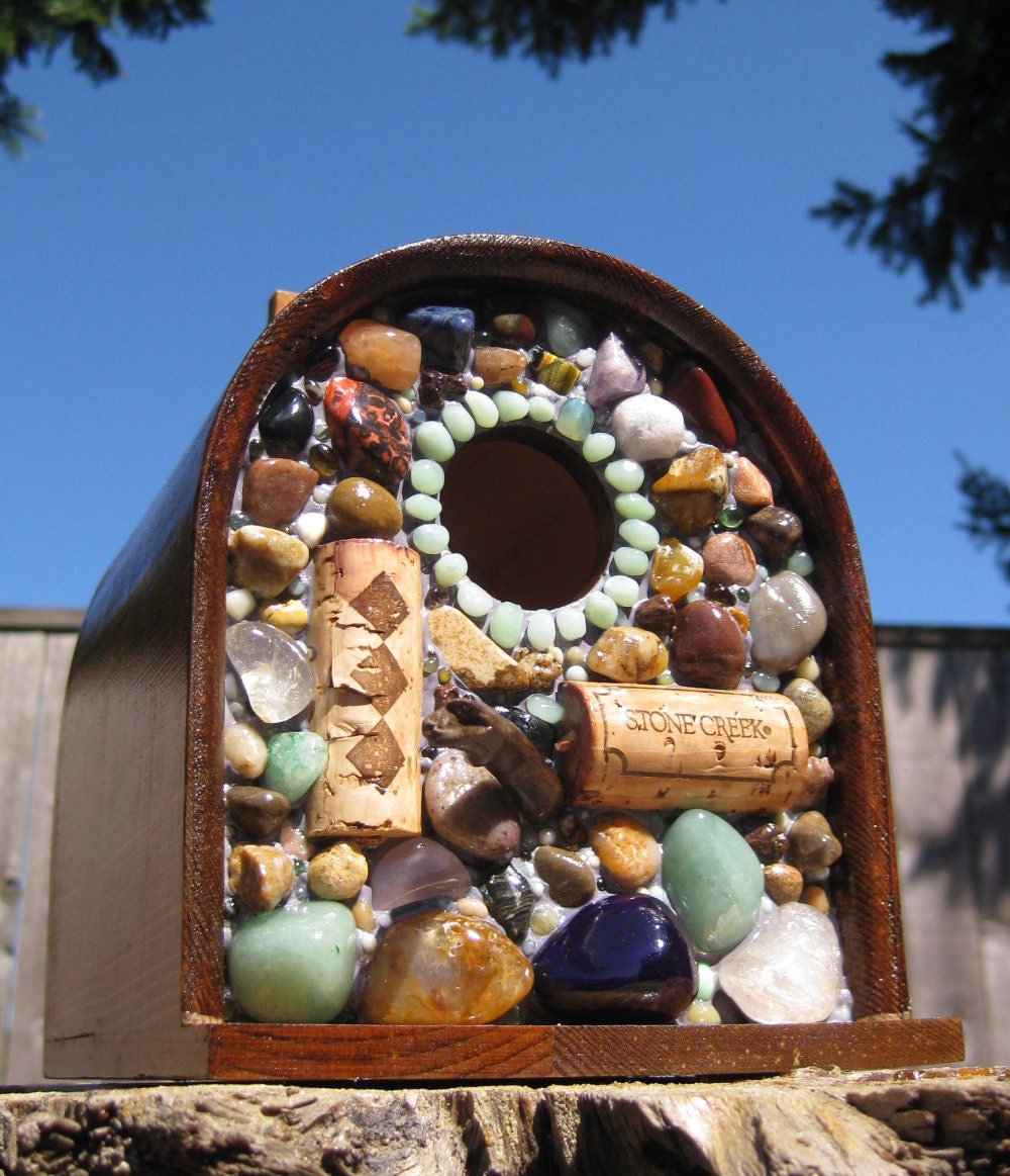 Stone Birdhouse ready to hang on a fence or tree