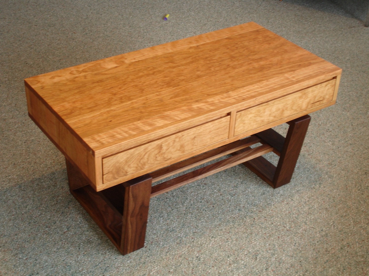 Mid century modern styled coffee table or bench with drawers.