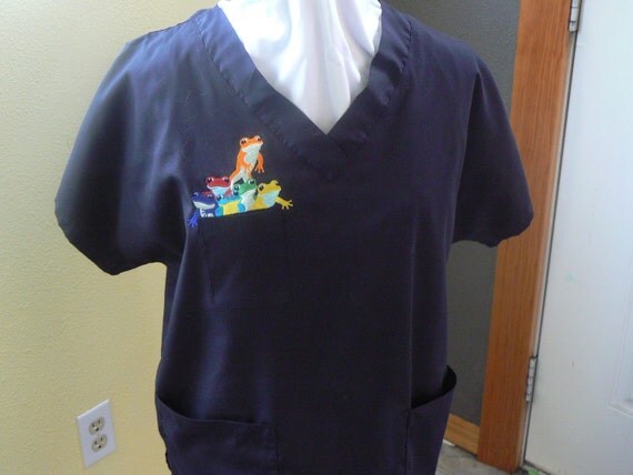 Items similar to Embroidered medical scrub top on Etsy