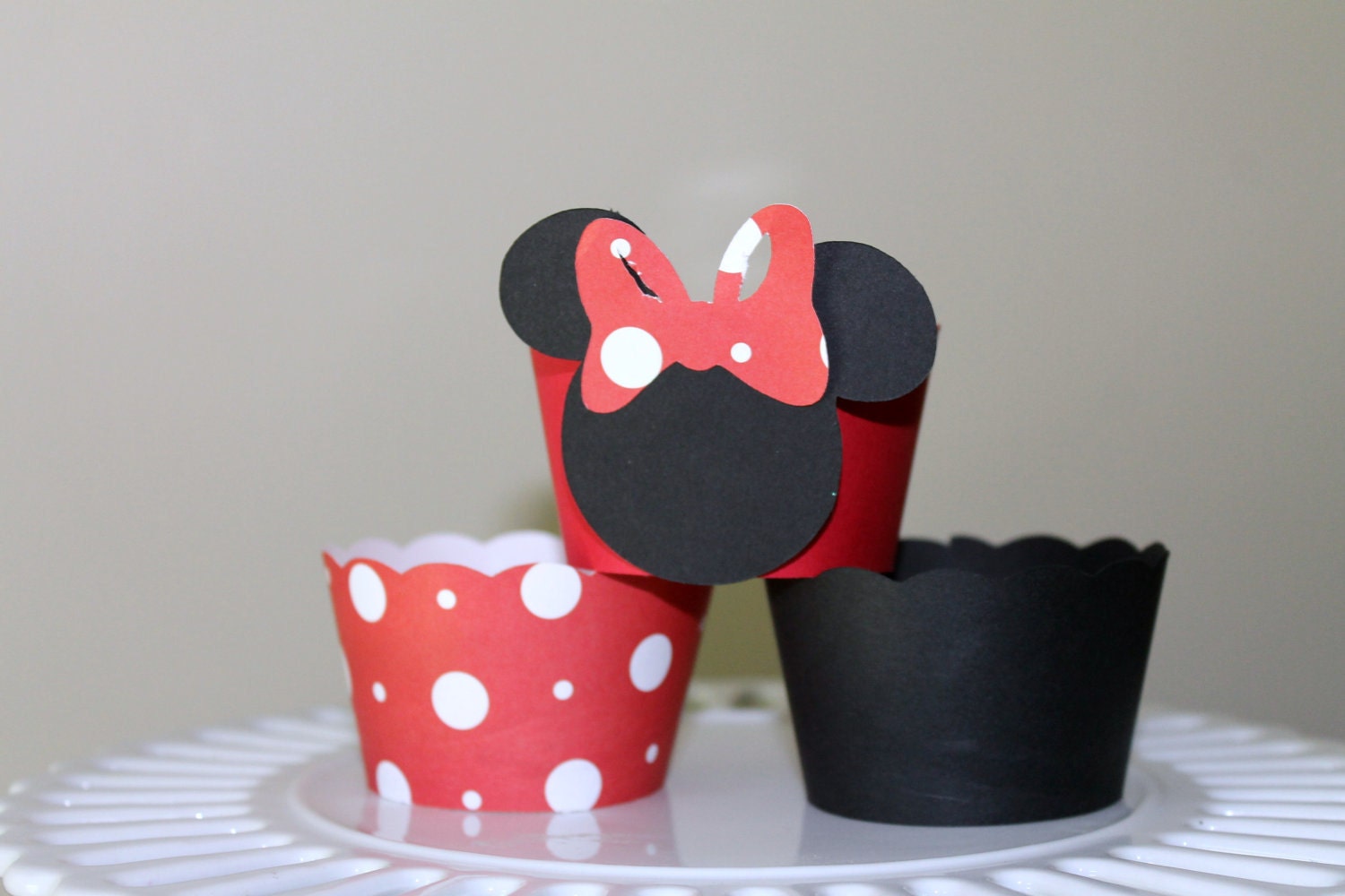 Red and White Polka Dot Minnie Mouse Cupcake by SWEETSINCLAIRS