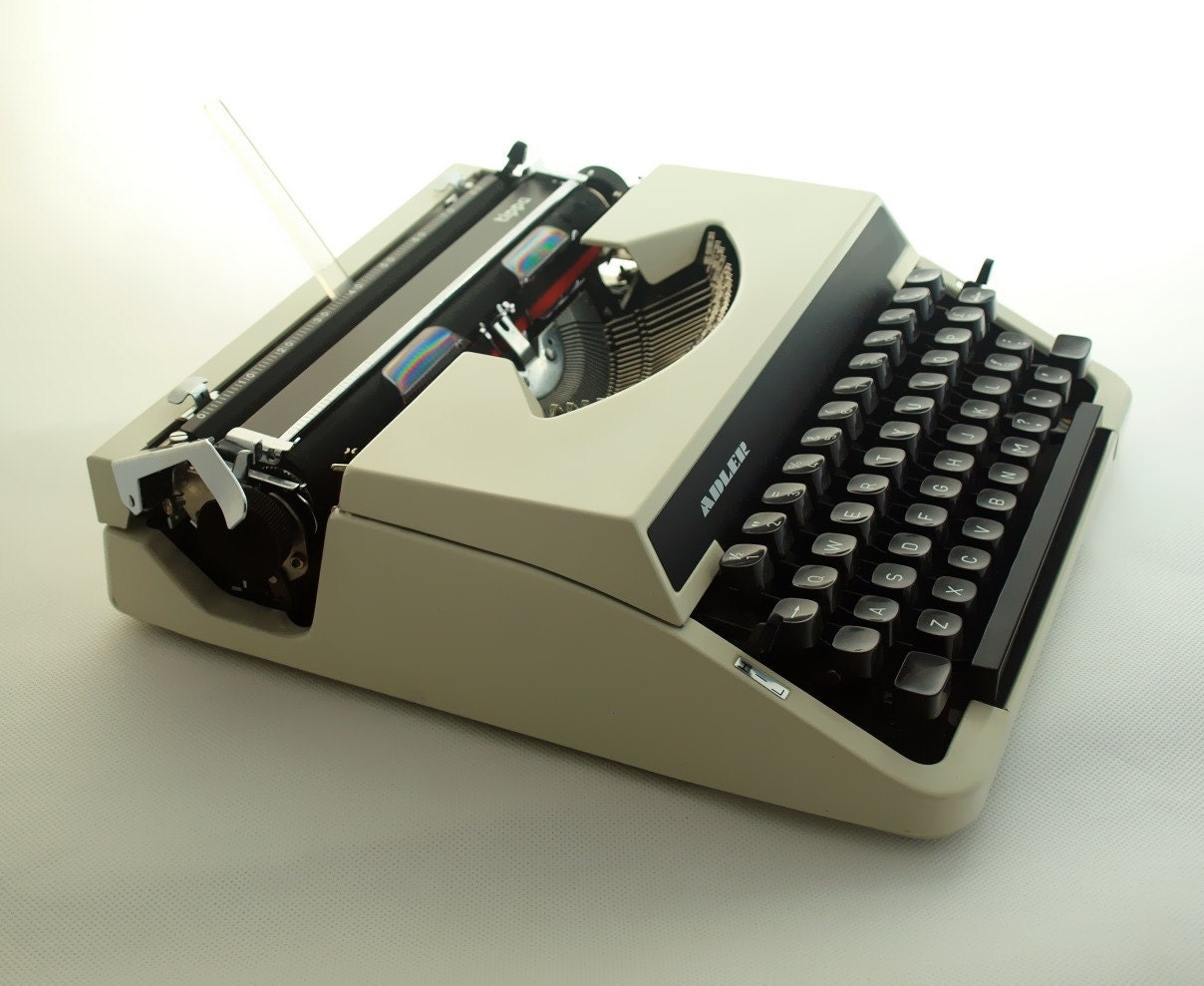 Vintage typewriter, Black and White typewriter ADLER, Traweller Olympia ...