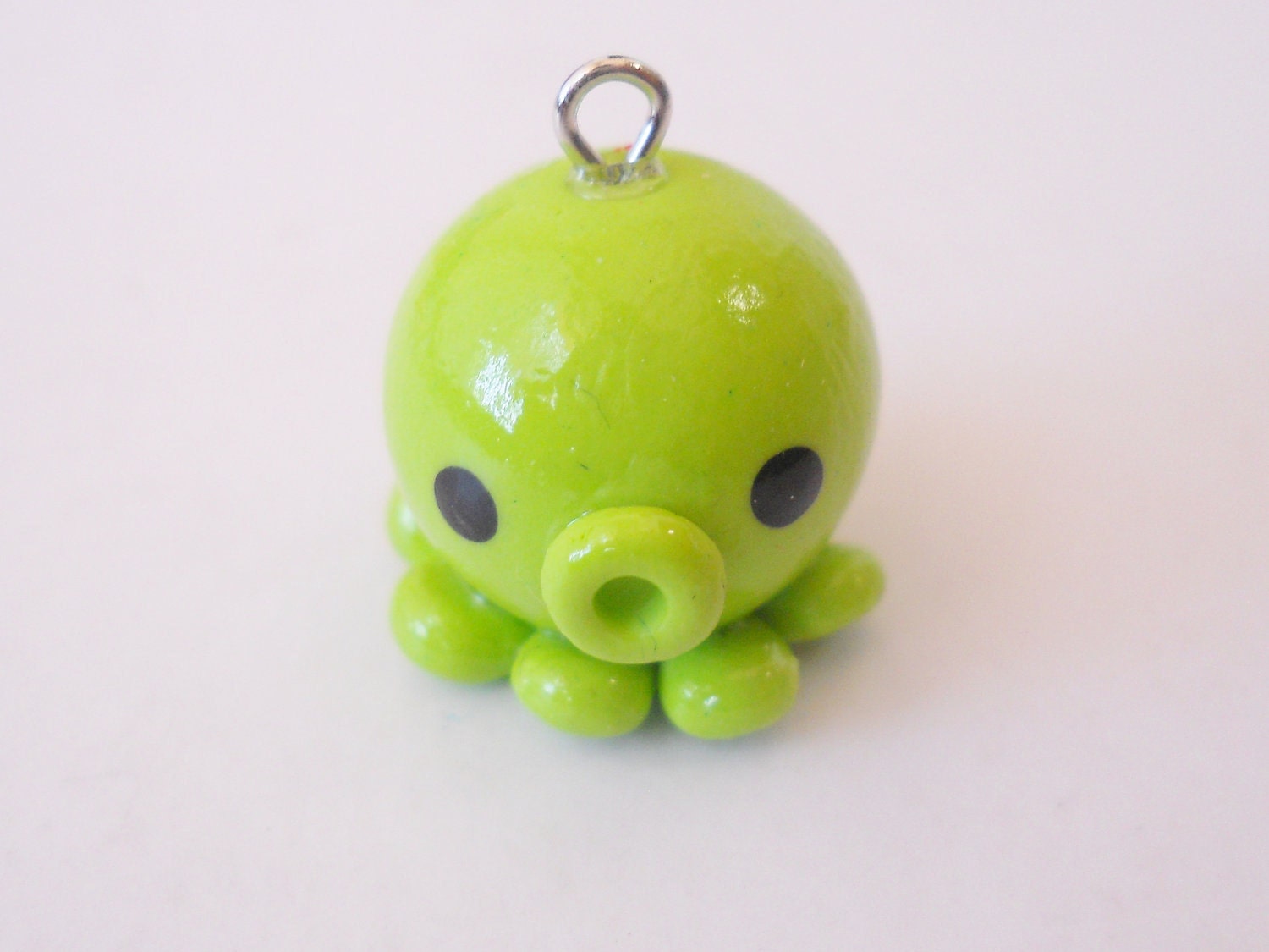 Items similar to Cute Polymer Clay Green Baby Octopus Charm on Etsy