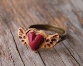 Items similar to Winged Heart ring on Etsy