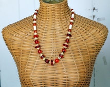 Popular items for tiki jewelry on Etsy
