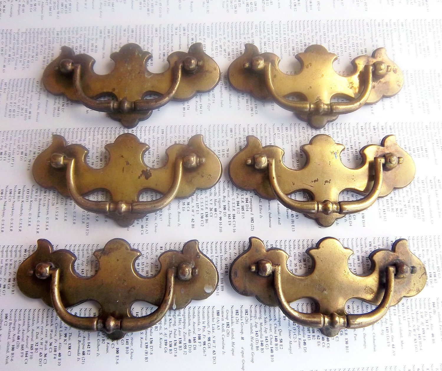 SALE! 6 vintage curved shiny brass metal pull handles – Haute Juice