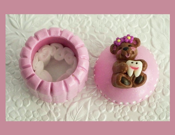 Tooth Fairy Holder with a cute teddy bear holding a tooth