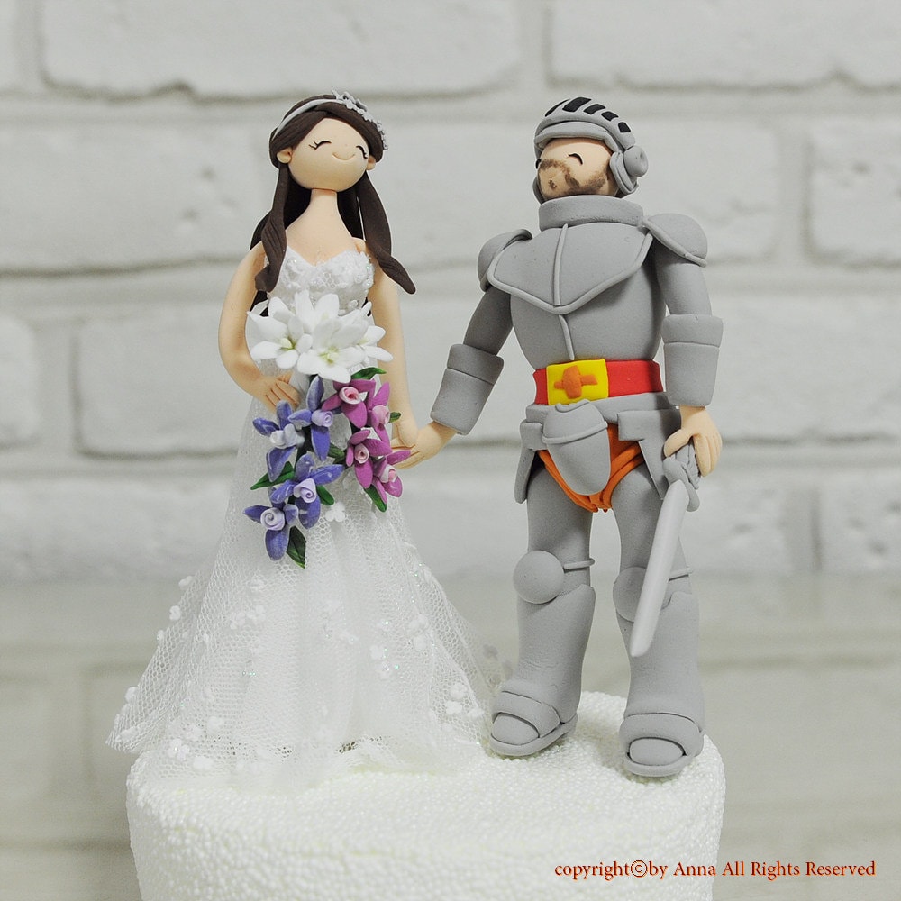 Knight and his cute bride custom wedding cake topper
