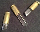 Items similar to Bullet and Acrylic shard pendant on Etsy