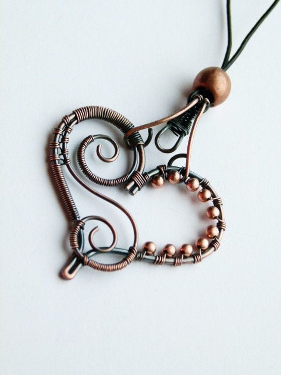 Copper wire wrapped heart pendant with natural thin leather