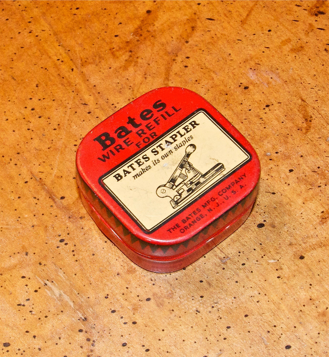 Vintage Bates wire refill for Bates stapler in red tin.