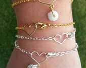 Items similar to Puka Shell Heart Charm bracelet, silver plated or Gold ...