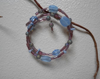 Items similar to Periwinkle glass flower necklace on Etsy