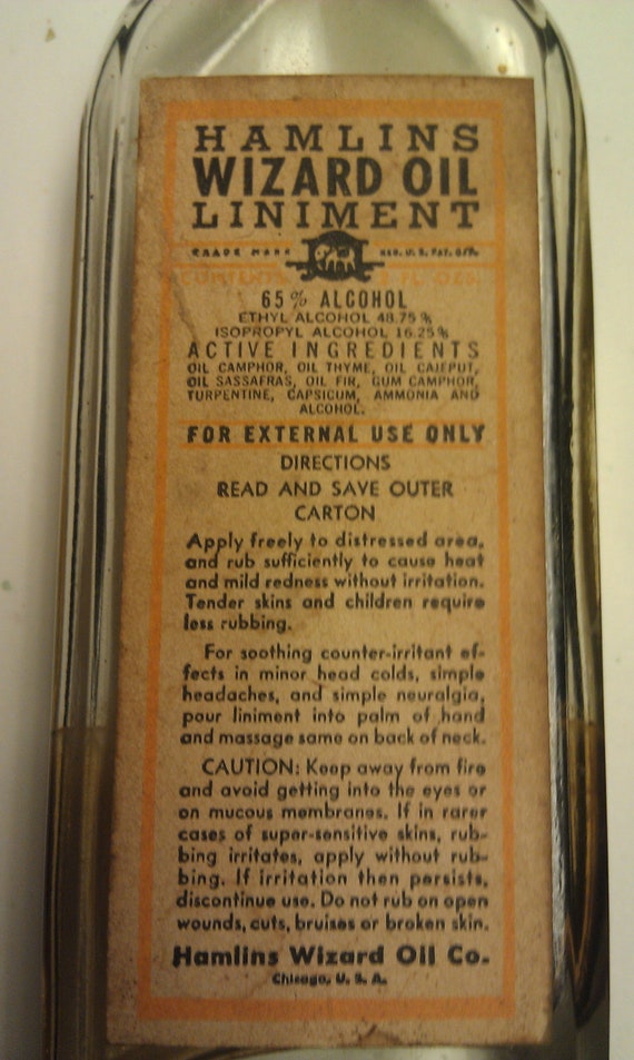 Antique glass bottle of Hamlins Wizard Oil Liniment. Vintage