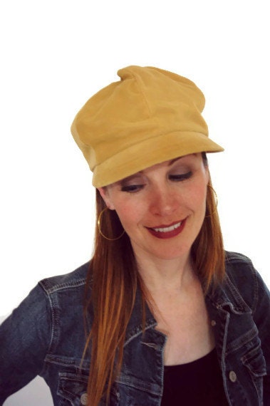 Mustard yellow velour vintage woman’s cap.