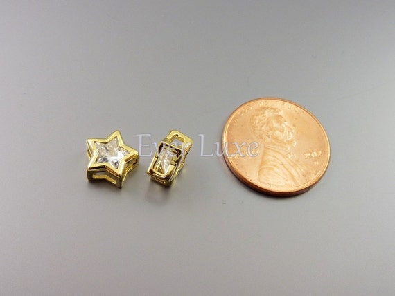 4 Small clear crystal Cubic Zirconia star beads gold brass