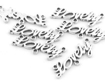 Popular items for silver word charms on Etsy